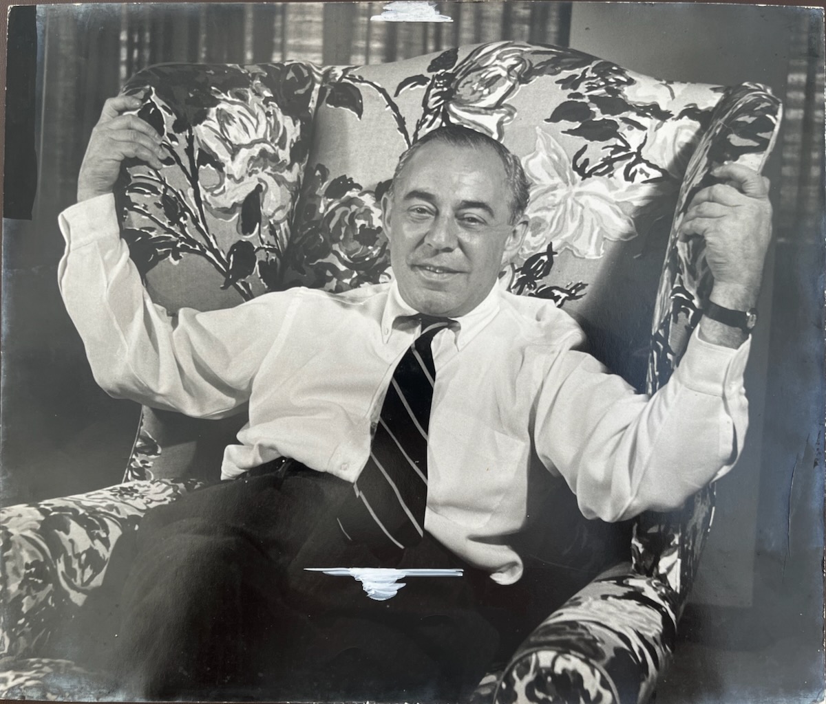 II. American Composer. [In armchair] 1902 - 79. Photographed by DOUGLAS ...
